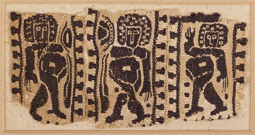 Fragments of an Coptic textile with woven depictions of a human figure