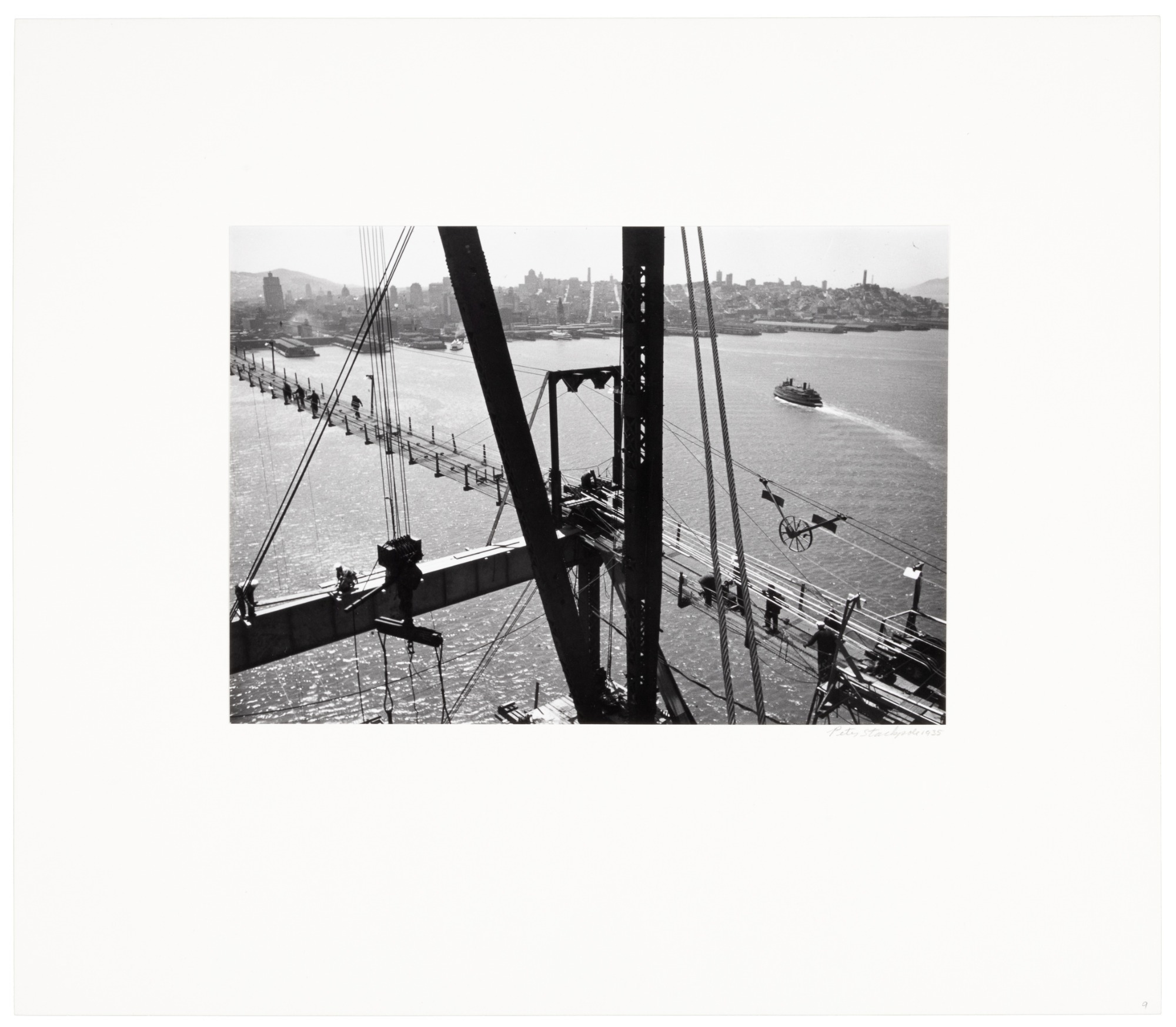 [From a tower top, out on a cross beam]