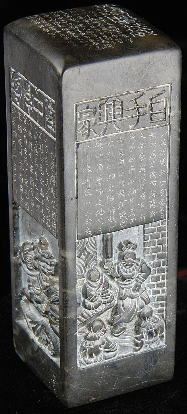 Carved Japanese stone column (onyx?), featuring heroic scenes with ...